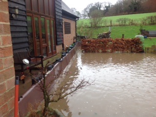 Floodstop temporary flood defences save household - traffic safety